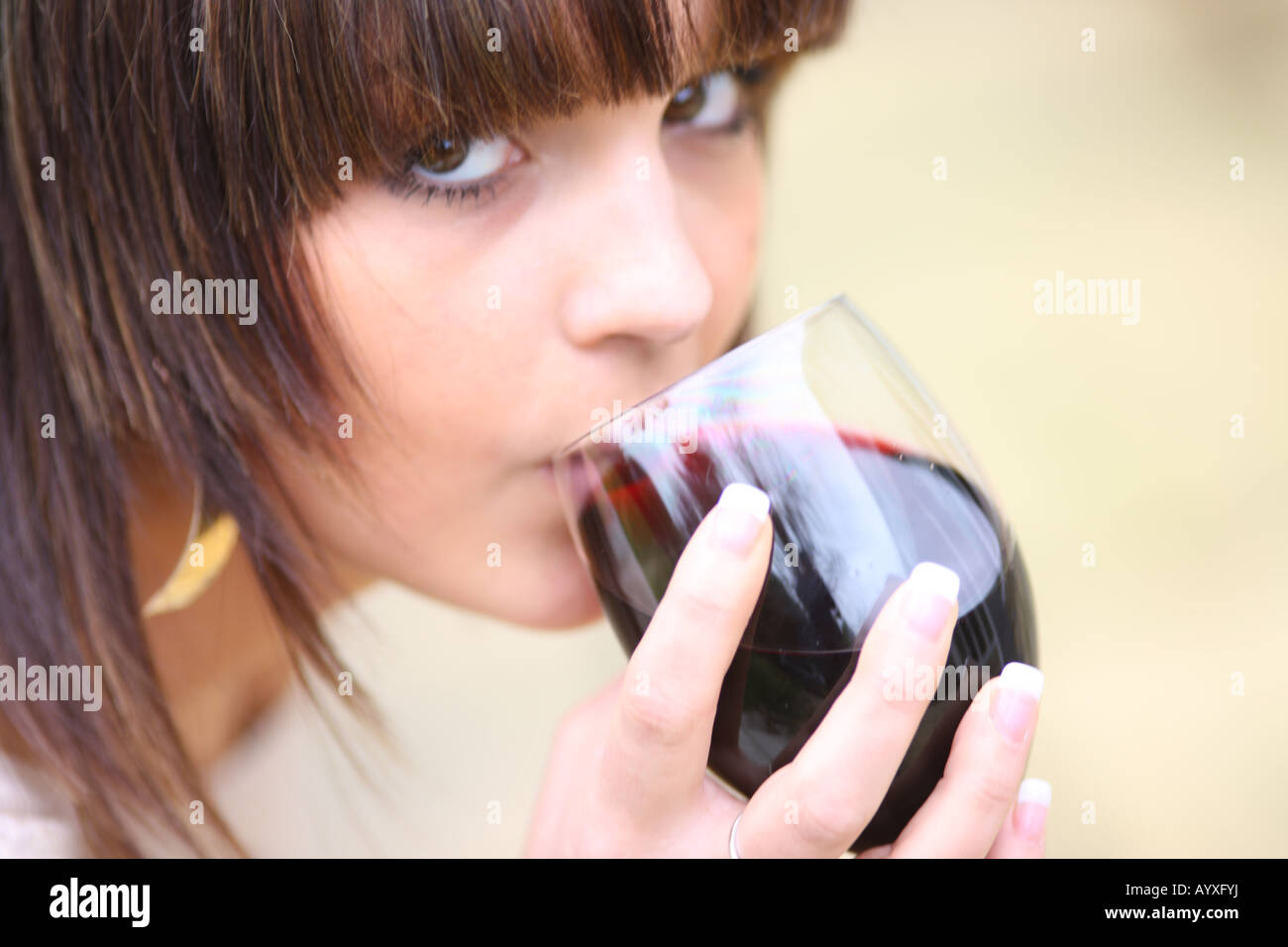 Teenage Girl Drinking Red Wine Model Released Stock Photo - Alamy