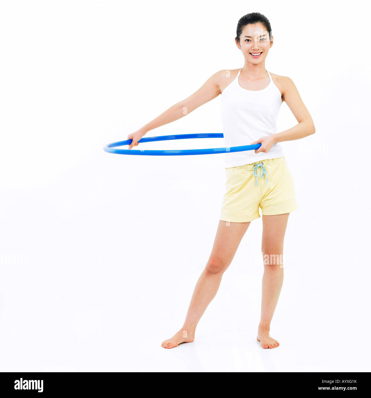 a woman doing a hula hoop Stock Photo - Alamy