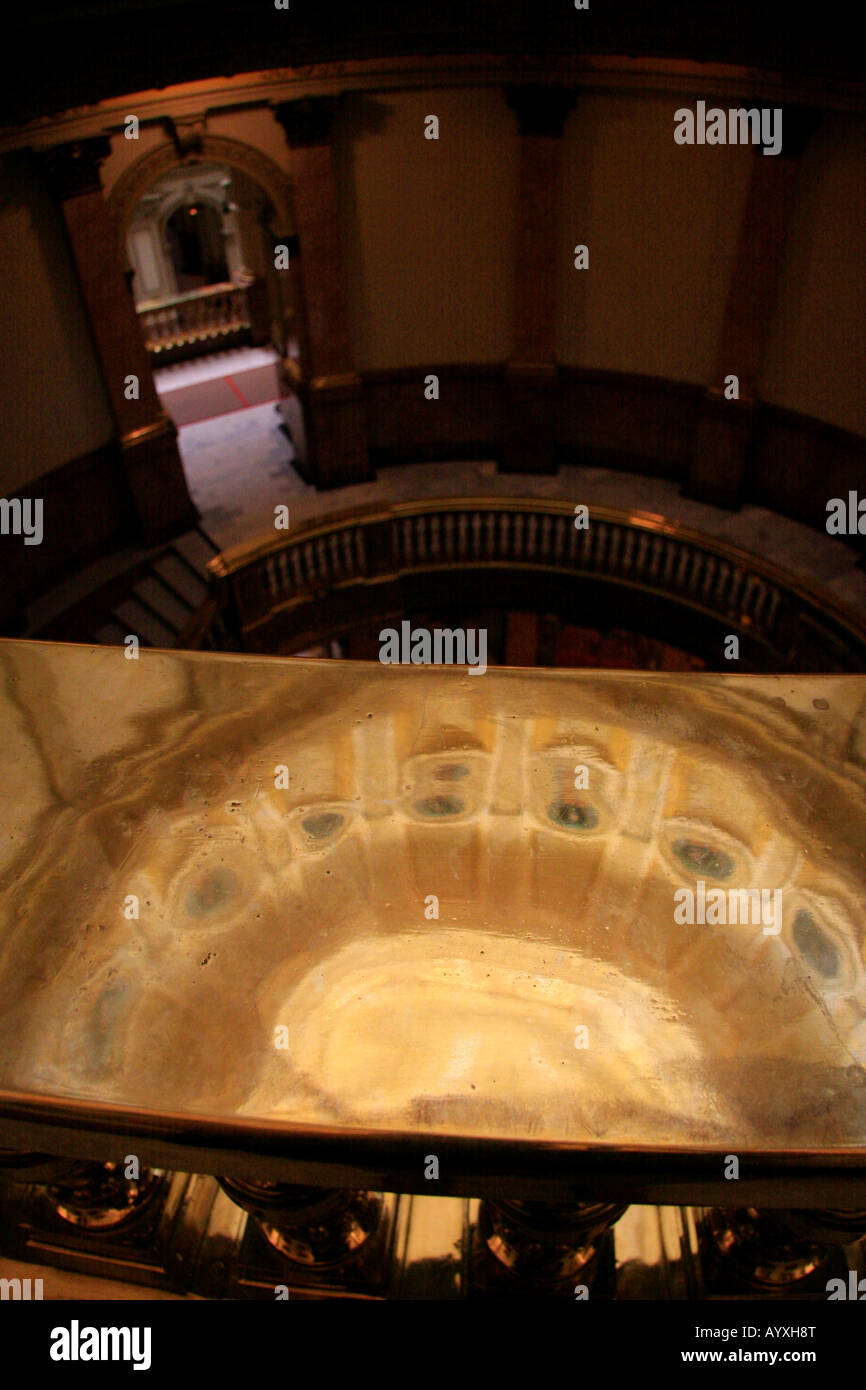 Reflection of dome in polished brass balustrade inside capitol building ...
