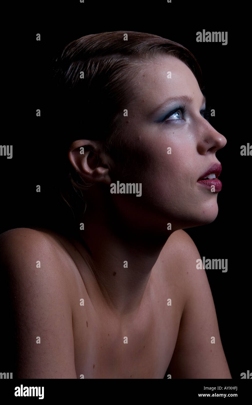 girl against a black background Stock Photo - Alamy