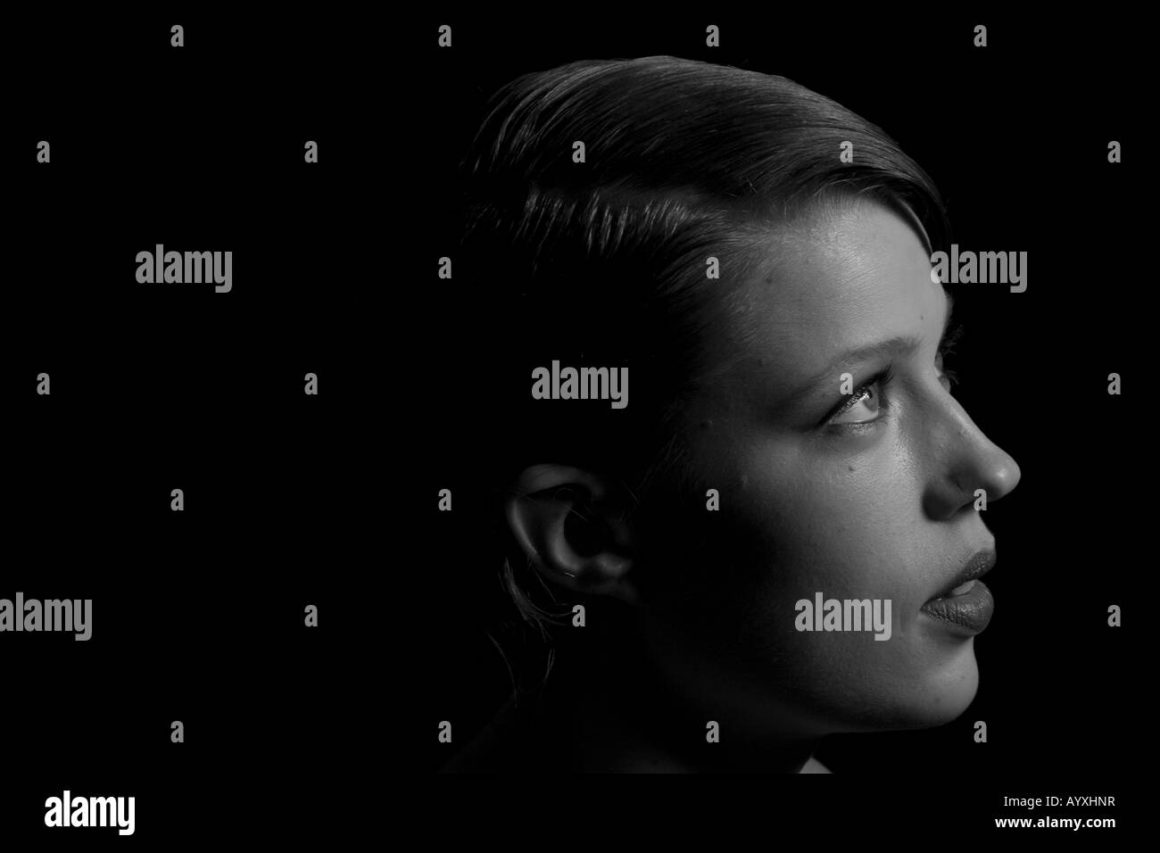 girl against a black background Stock Photo - Alamy