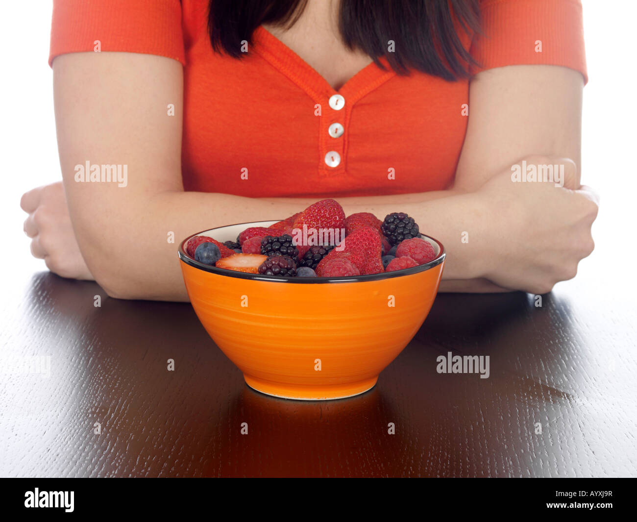 Young Woman with Bowl of Mixed Berries Model Released Stock Photo - Alamy