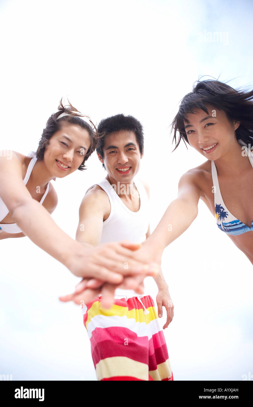 people in swimwear cheering together Stock Photo - Alamy