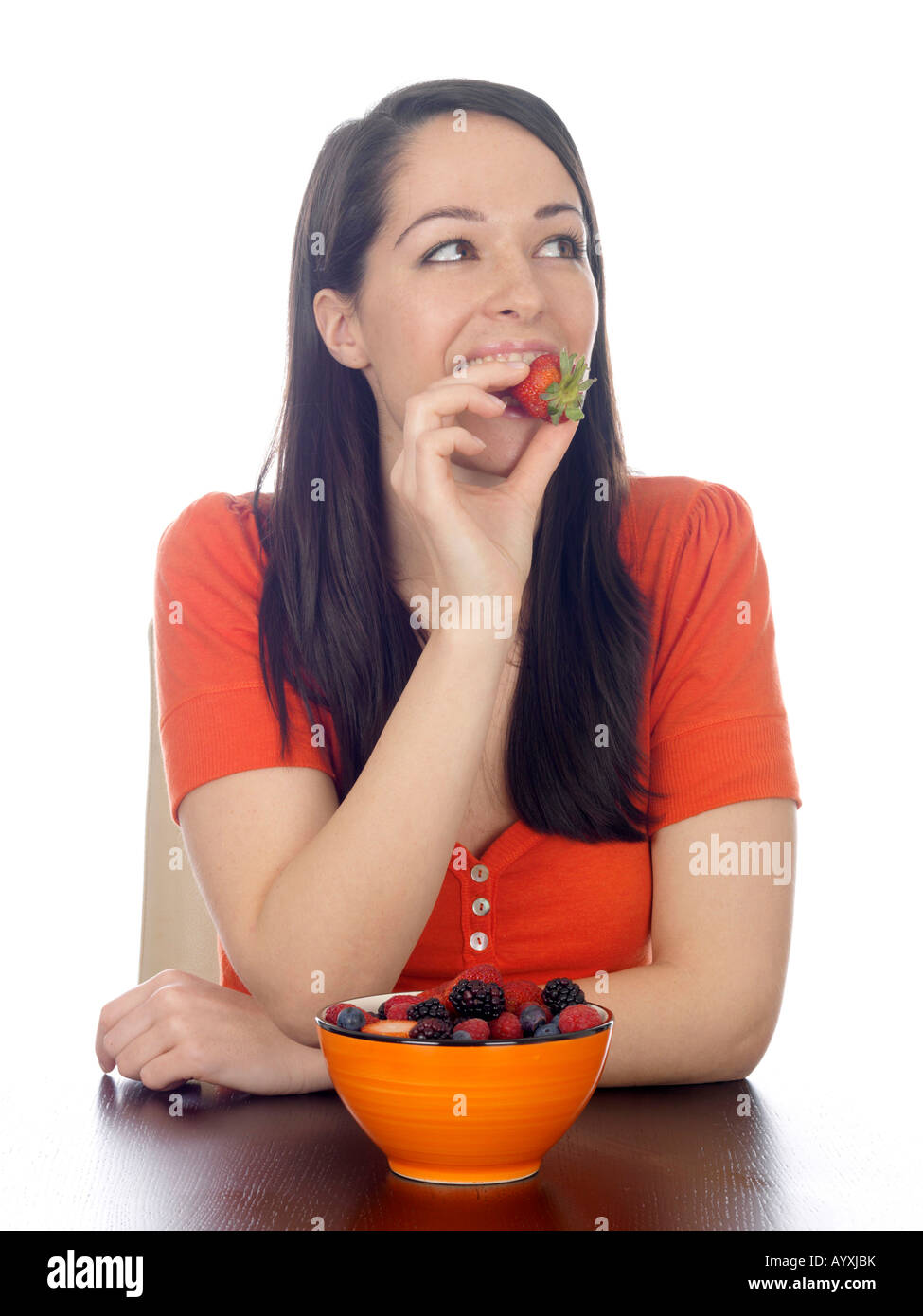 Young Woman Eating Mixed Berries Model Released Stock Photo - Alamy