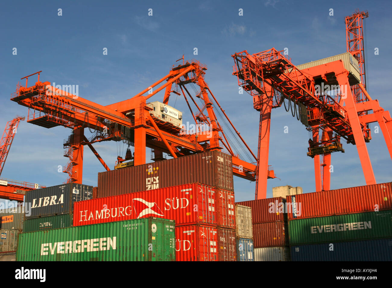 Cranes and containers in a dock Stock Photo - Alamy