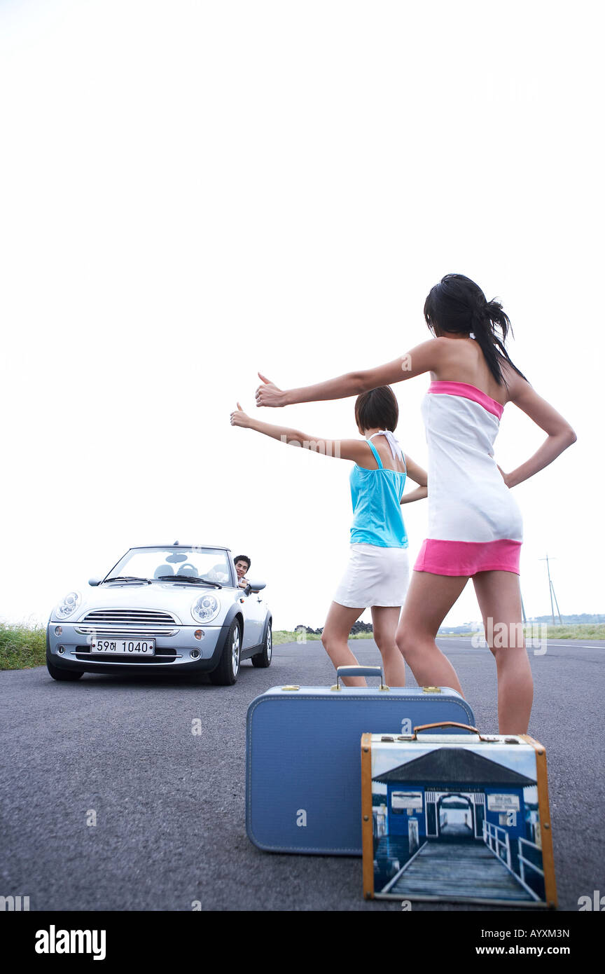 Women posing with automobile hi-res stock photography and images - Alamy