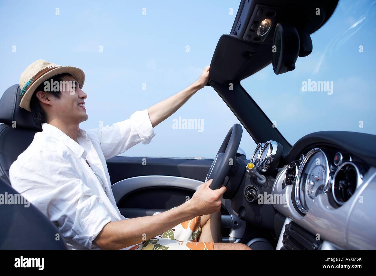 a man driving the sports car Stock Photo - Alamy