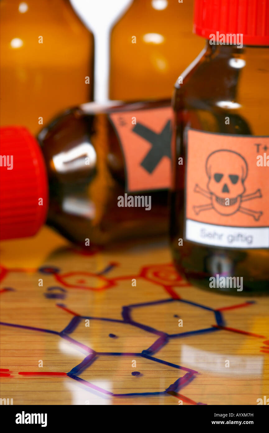 Brown flasks with several toxic liquids Stock Photo - Alamy