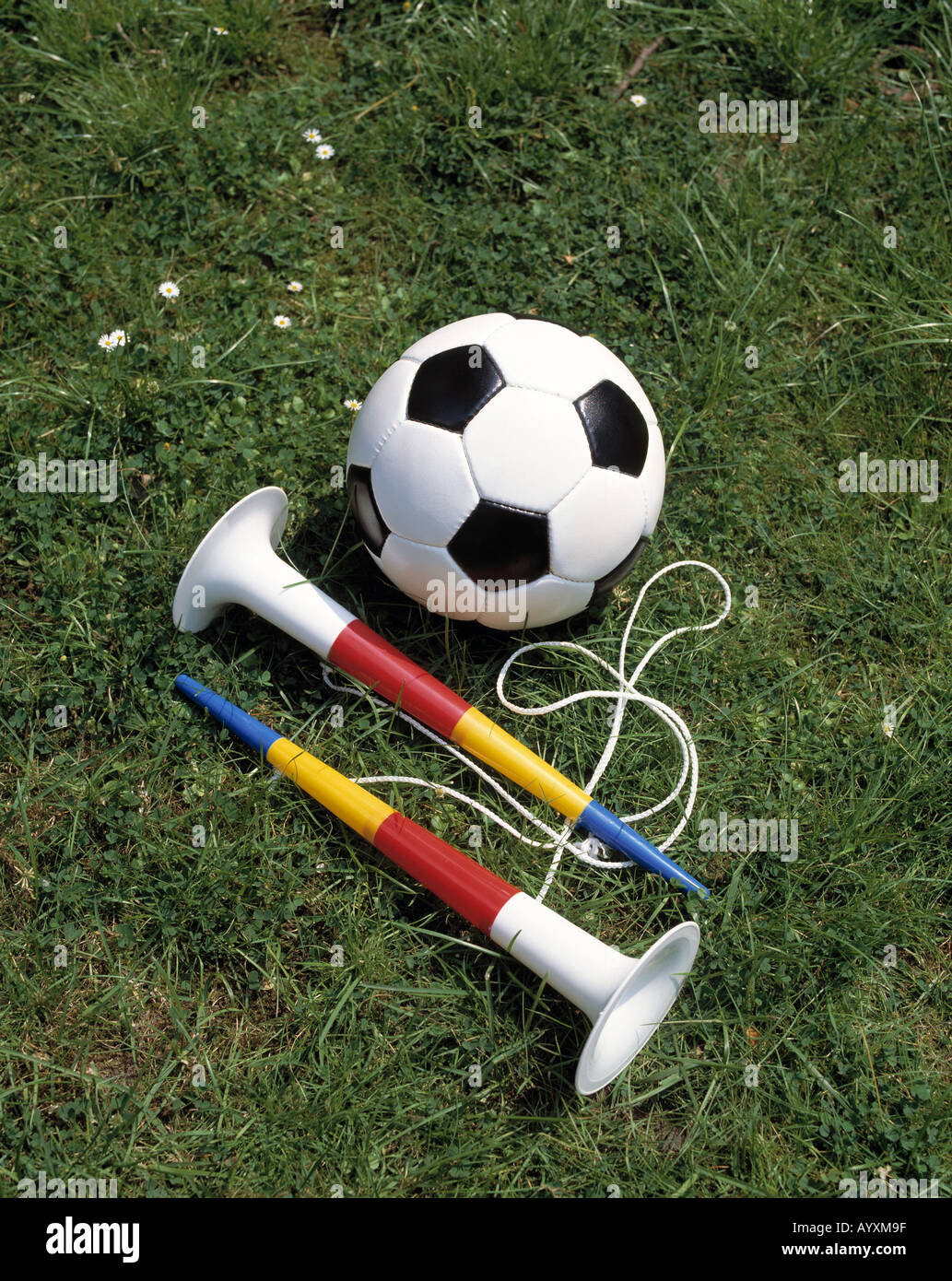 sports, football, ball with two trumpets, symbolic photograph Stock ...