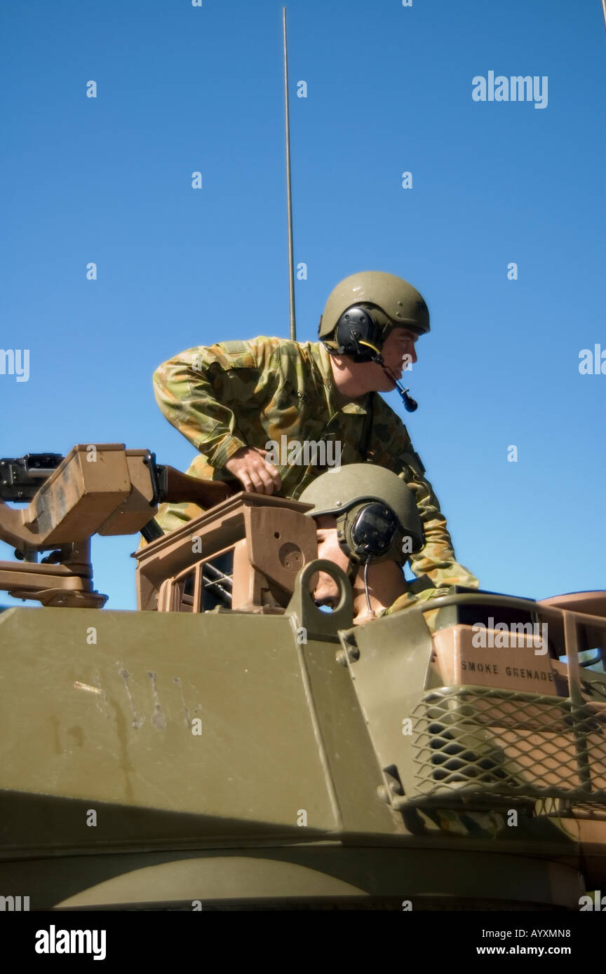 AUSLAV Driver Australian Army personnel carrier Stock Photo - Alamy