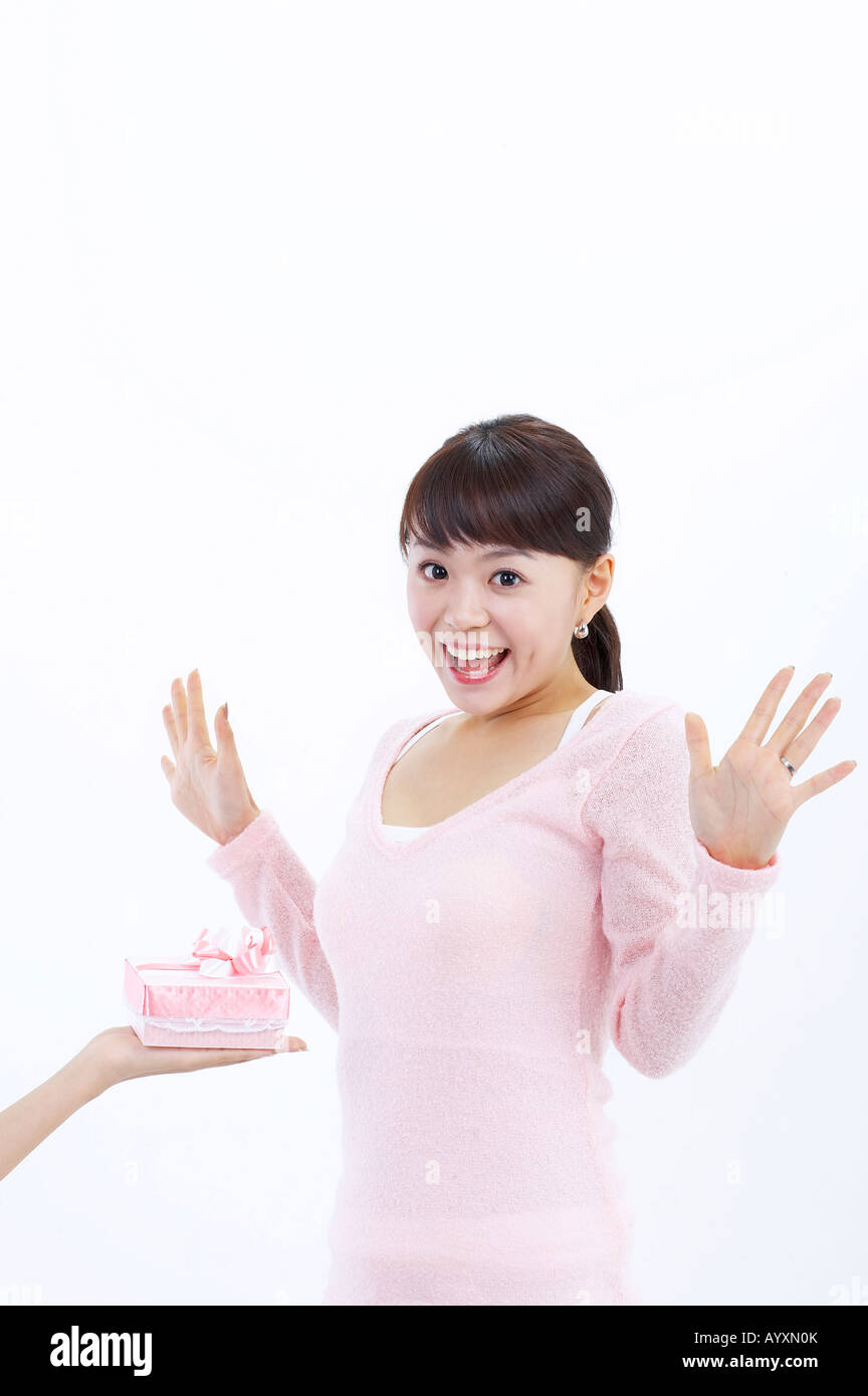 a woman being pleased looking at gift case Stock Photo - Alamy