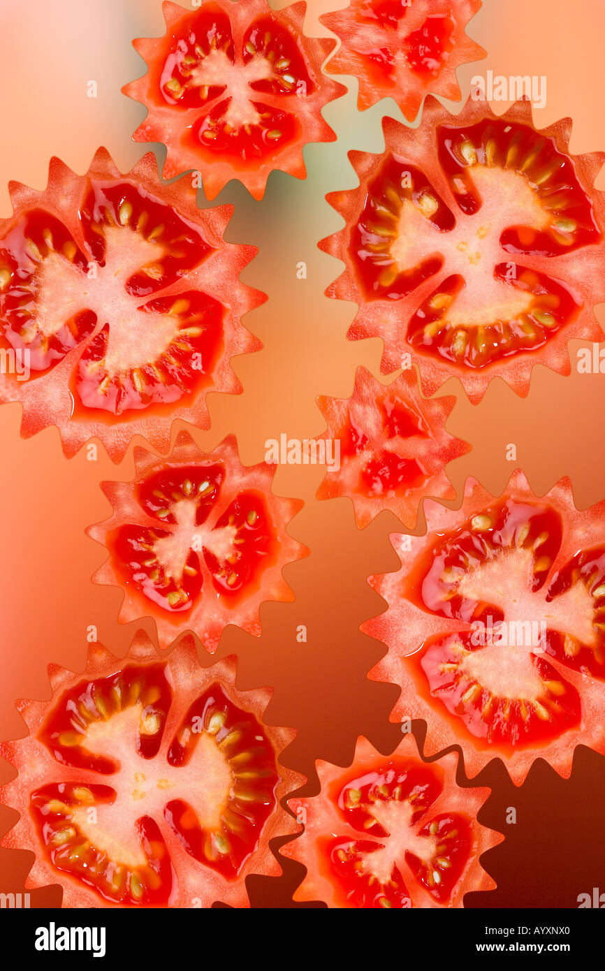 Tomato gear wheels Stock Photo - Alamy