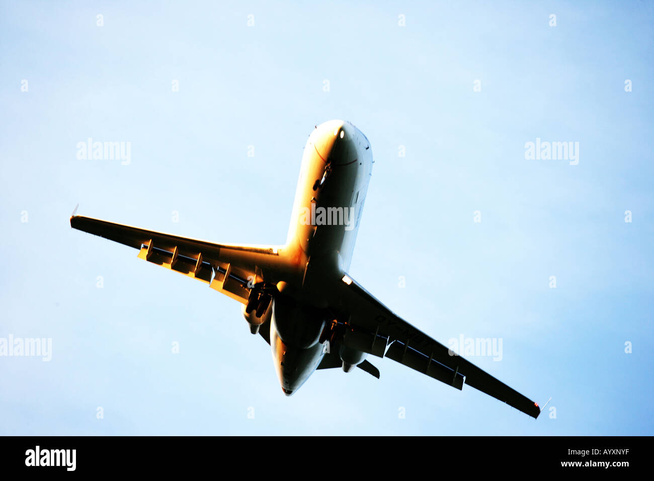 A landscape format image taken from underneath a jet aircraft with ...