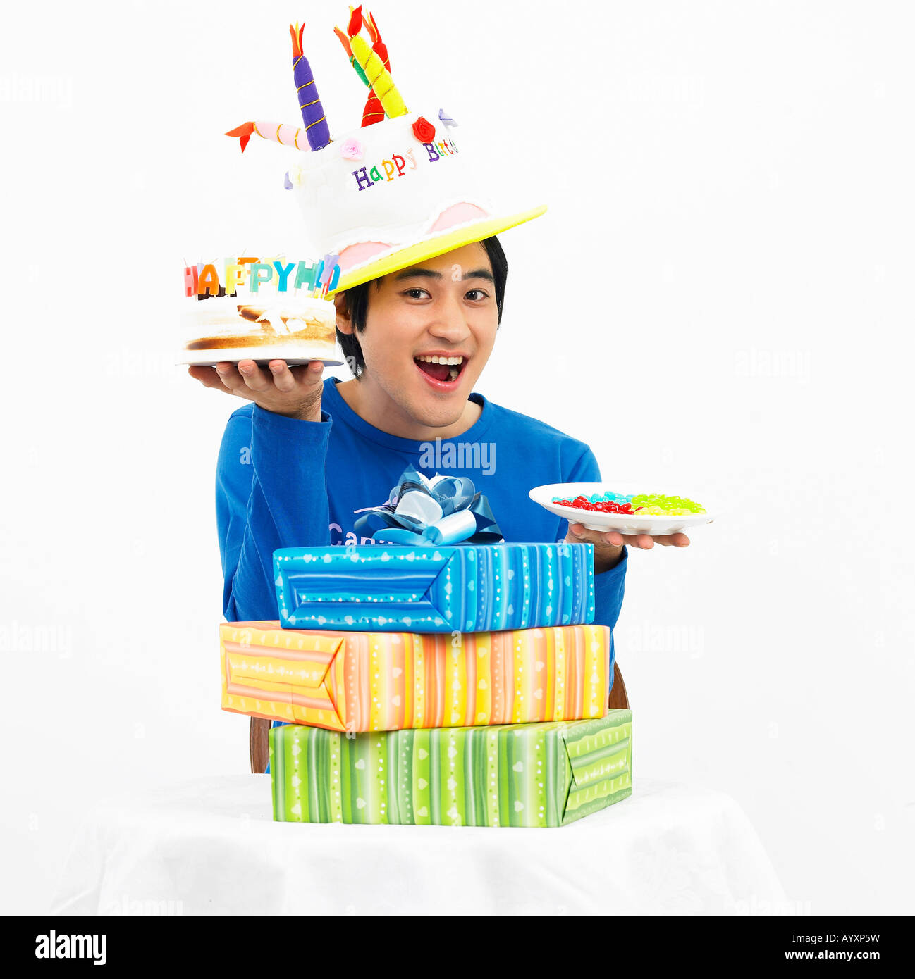smiling man holding cake and gift box Stock Photo - Alamy