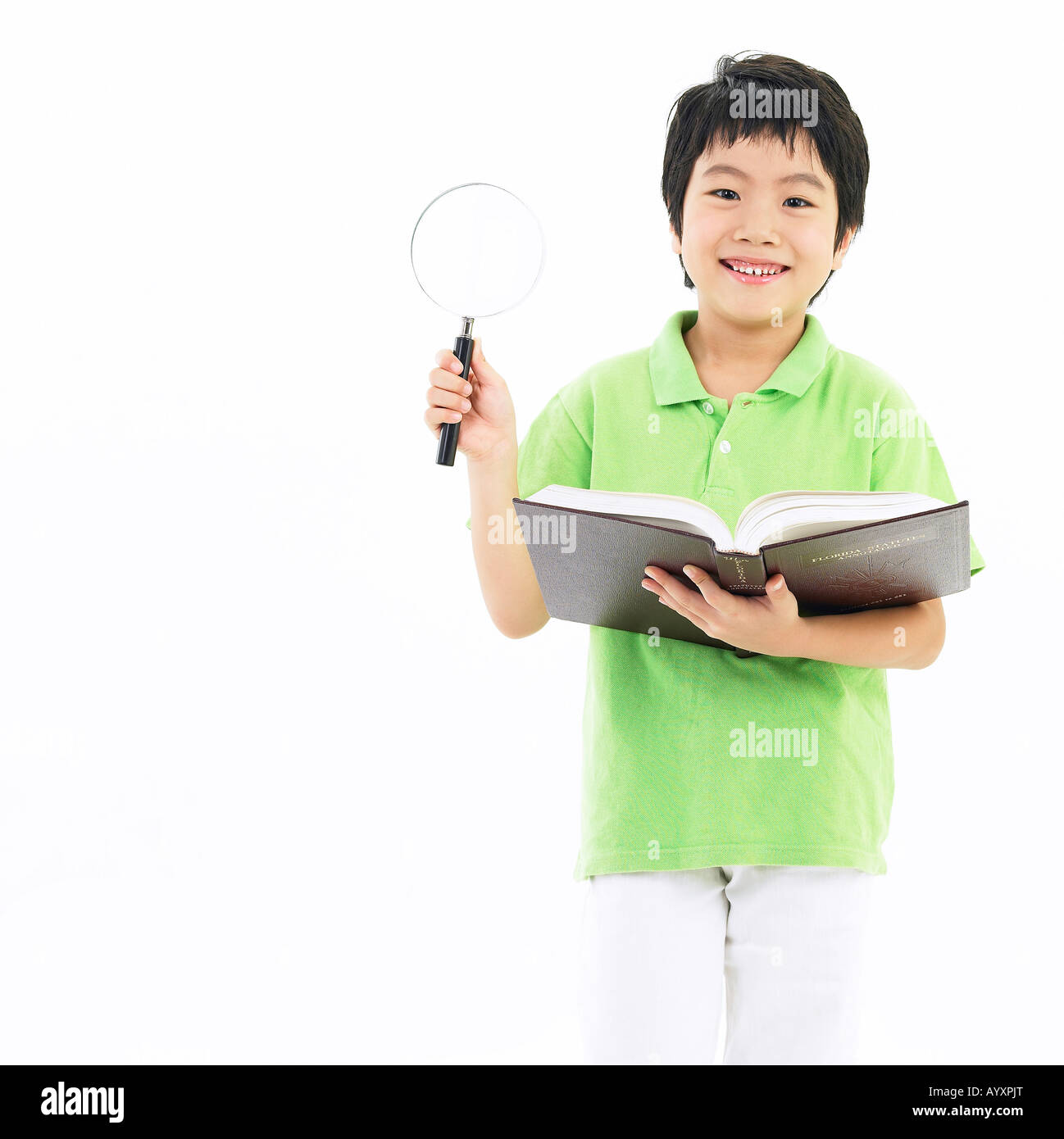 Smart asian boy reading book Cut Out Stock Images & Pictures - Alamy