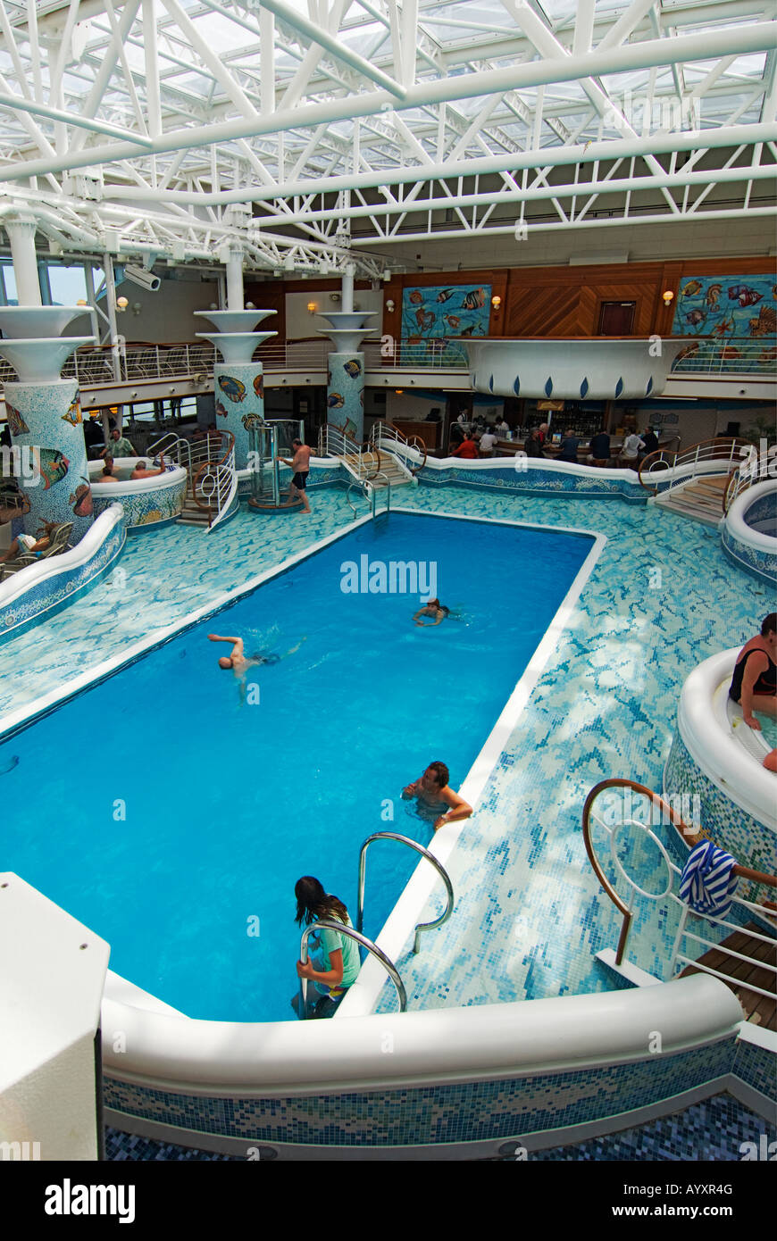 Covered swimming pool on board a cruise ship Stock Photo - Alamy
