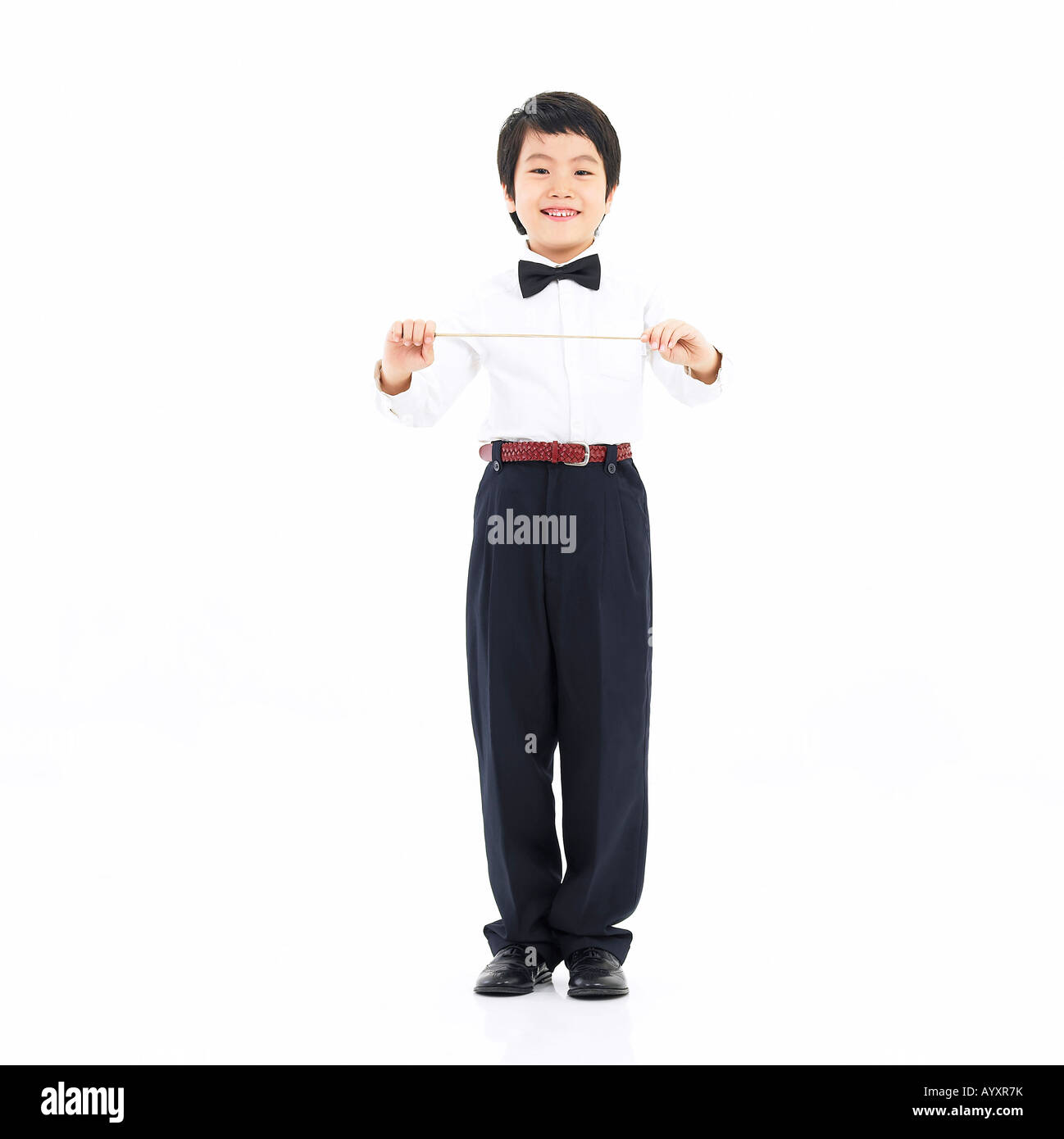 a boy holding a baton Stock Photo - Alamy