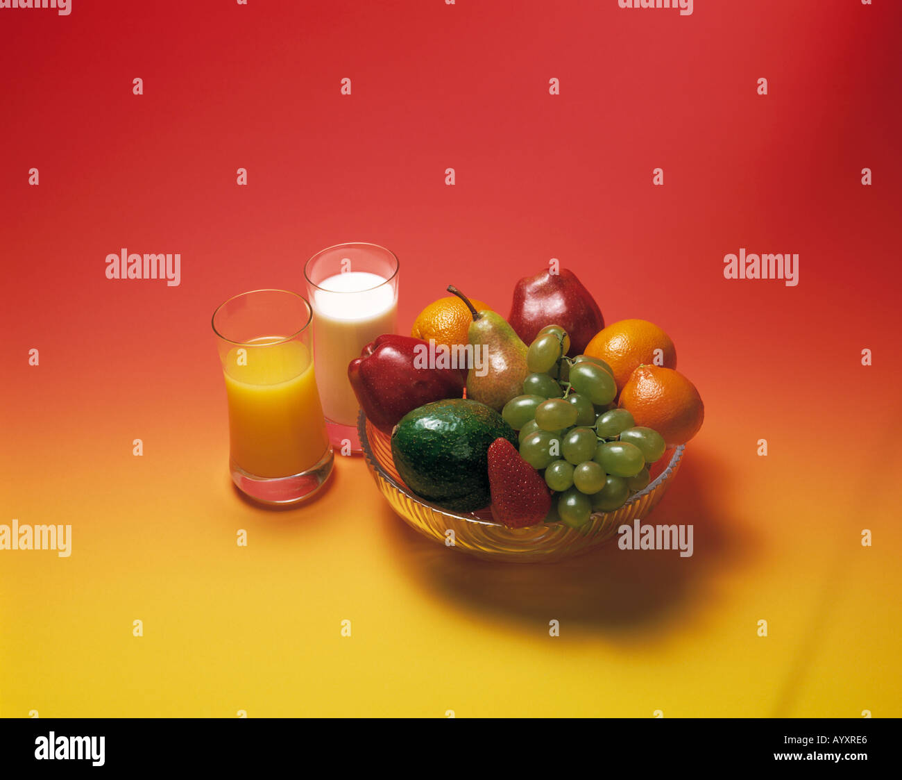 health, mixed fruits, glasses with milk and fruit juice Stock Photo - Alamy