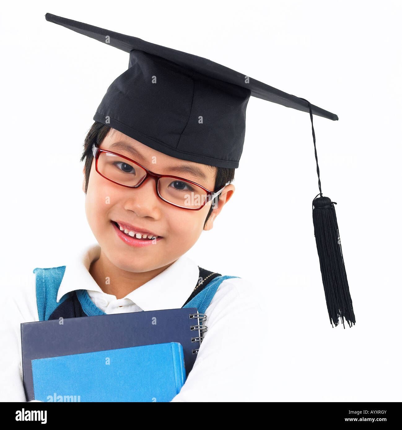 Boy student wearing graduation cap hi-res stock photography and images ...