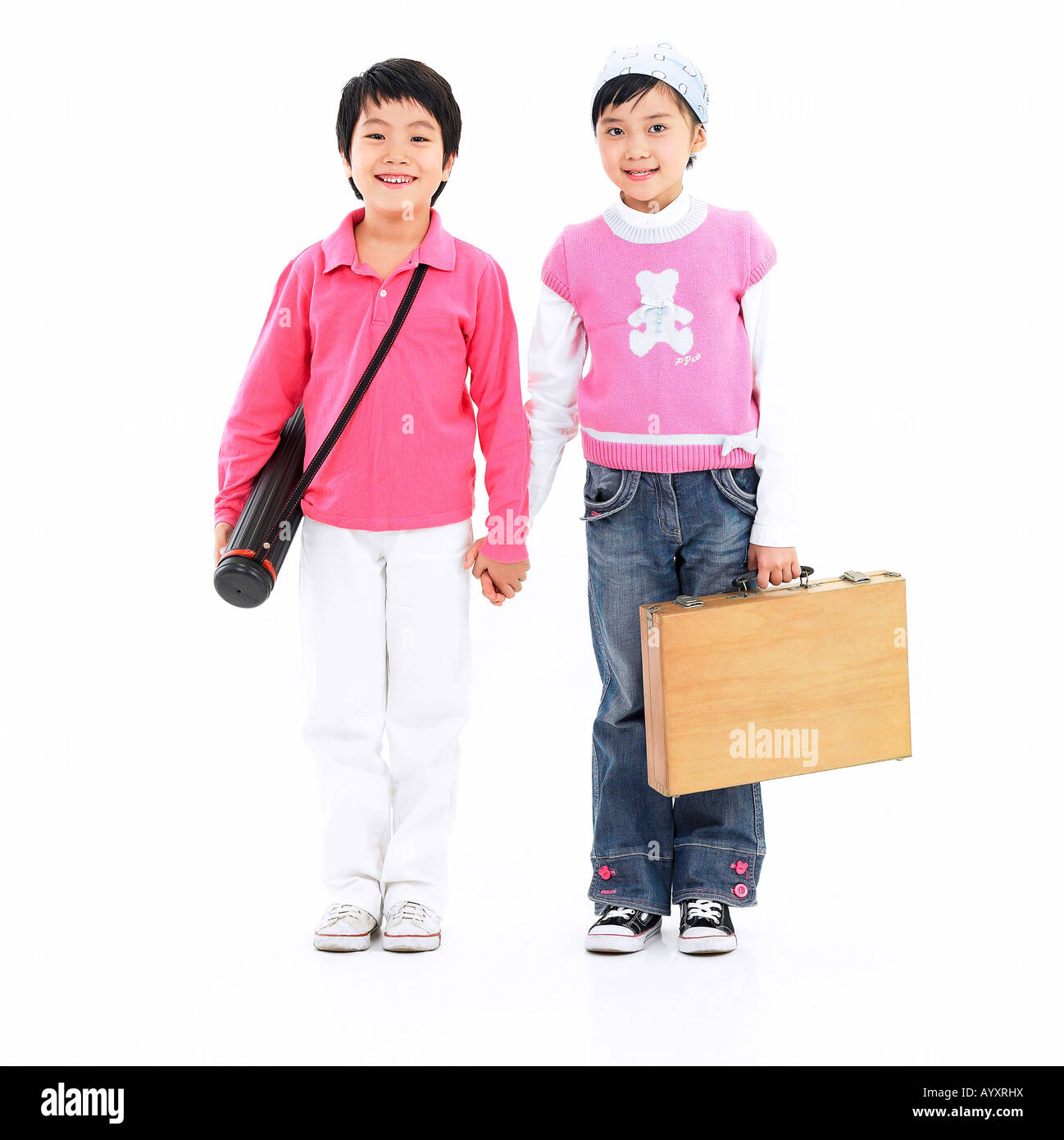 children standing with holding picture items Stock Photo - Alamy