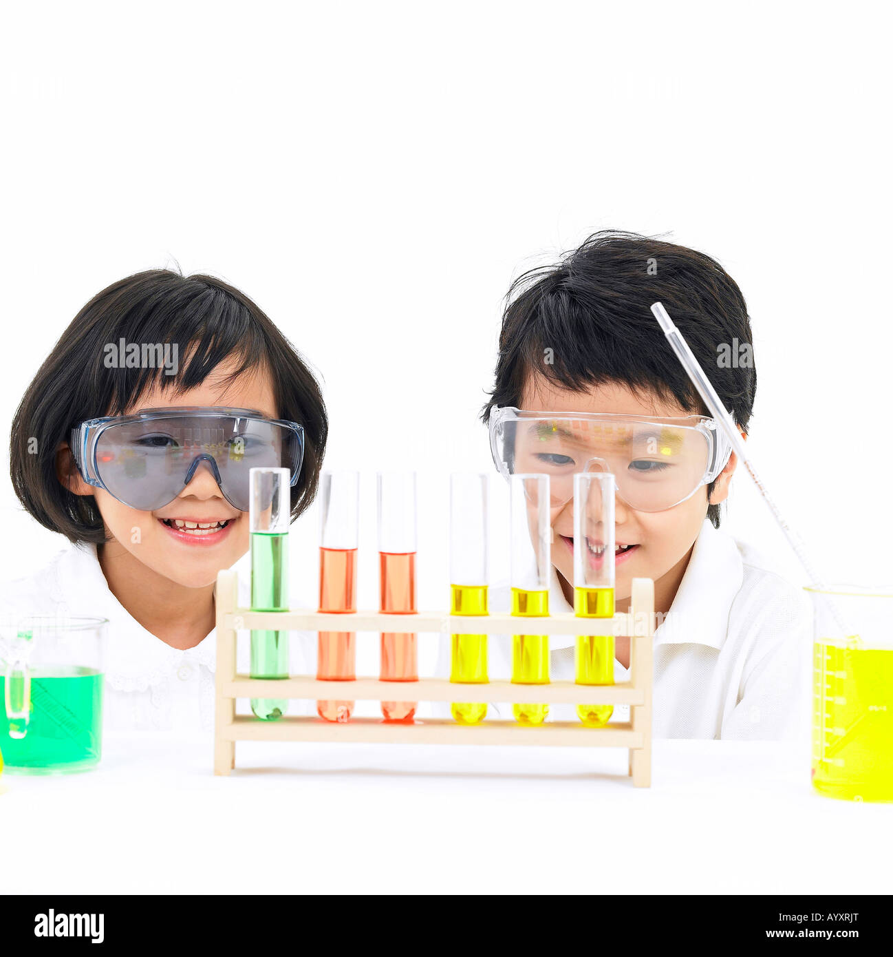 children doing science experiment with wearing protection glasses Stock ...