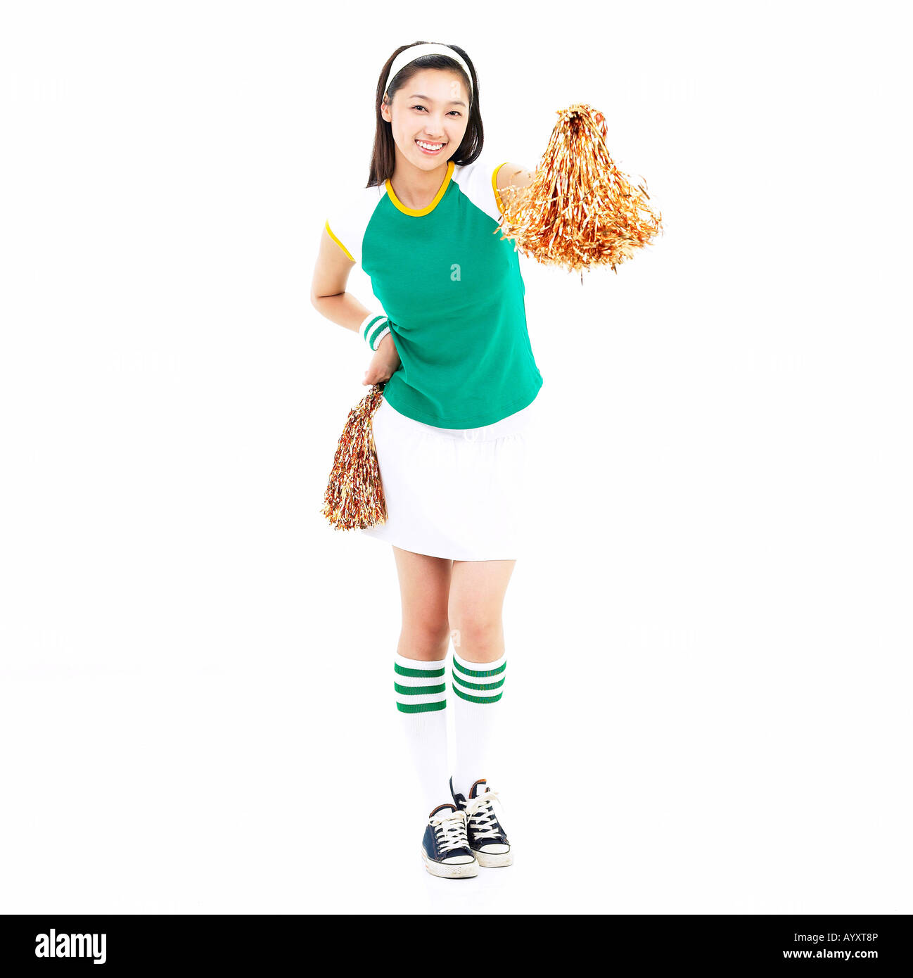 a girl student cheering with shaking plumes Stock Photo - Alamy