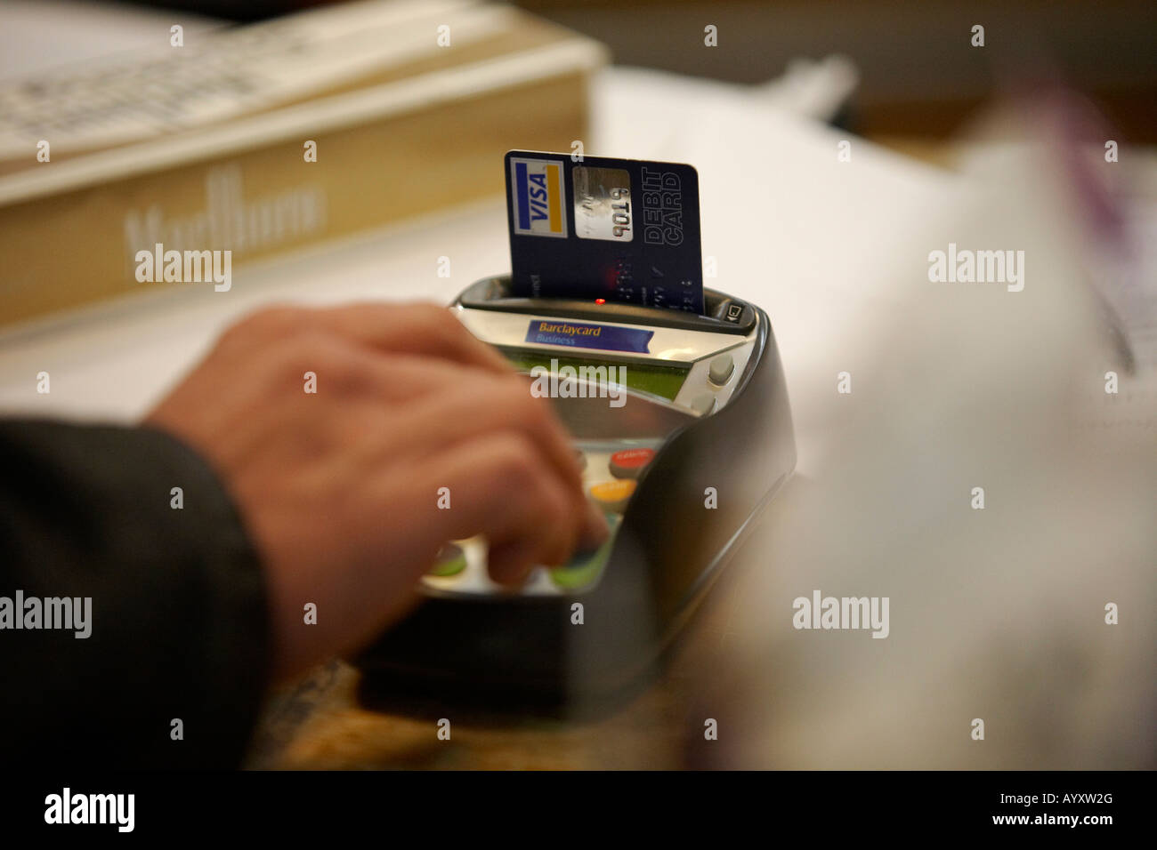 A credit card being used to pay for goods in shop Stock Photo - Alamy