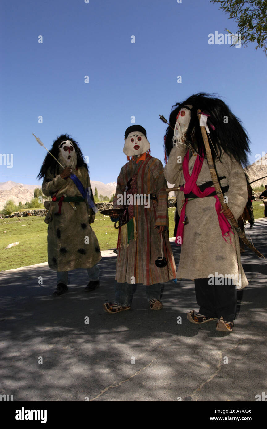 Ladakhi men in traditional dress and masks performing during the Ladakh ...