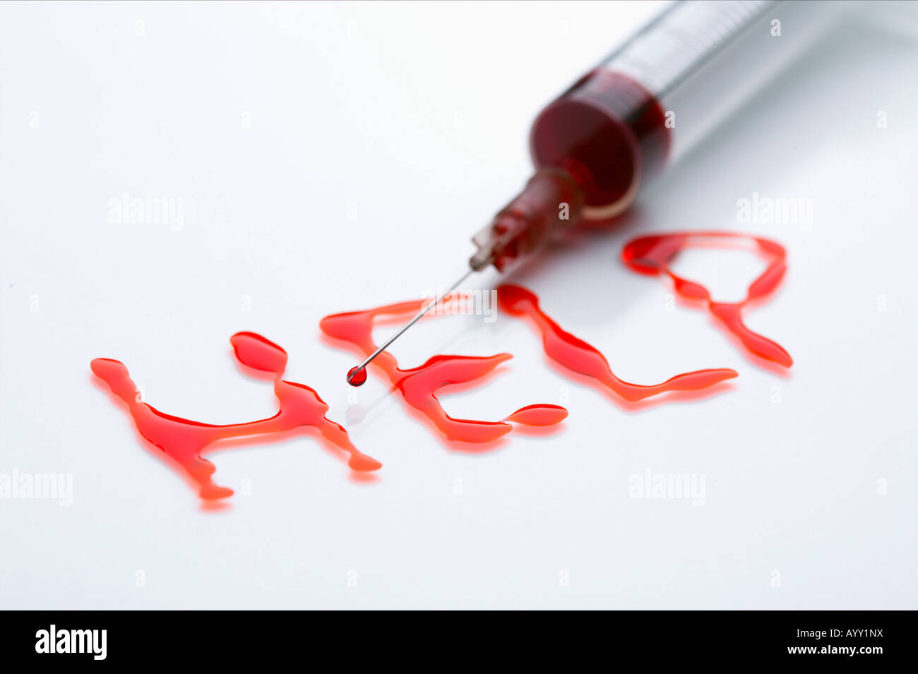 Red written word HELP and a syringe Stock Photo - Alamy