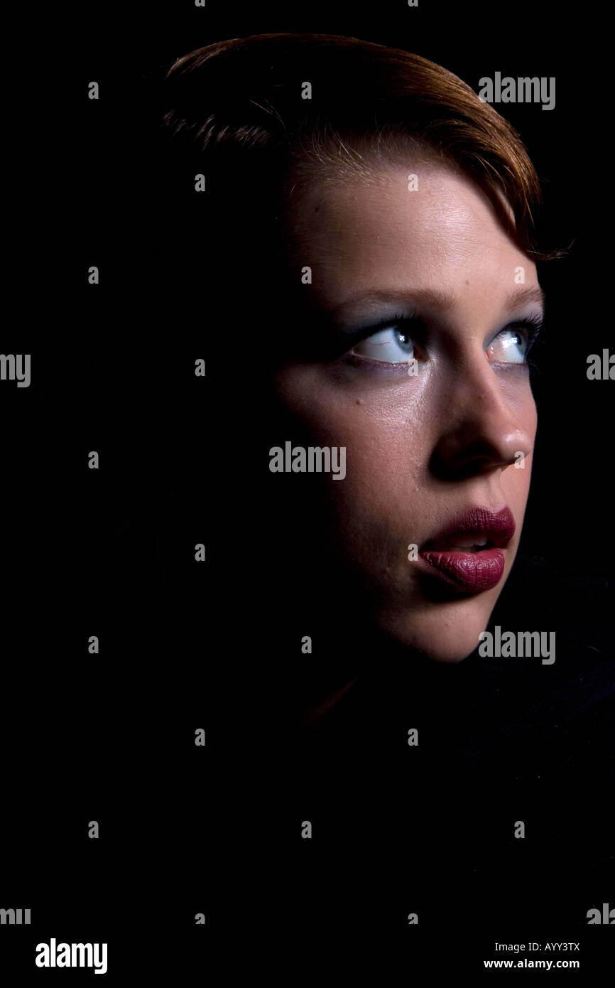 girl against a black background Stock Photo - Alamy