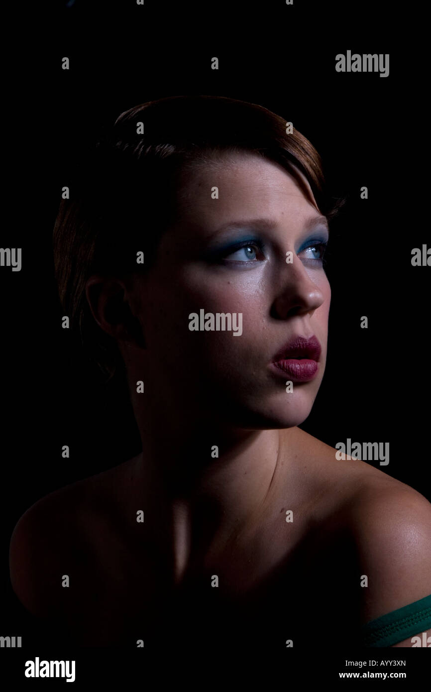 girl against a black background Stock Photo - Alamy