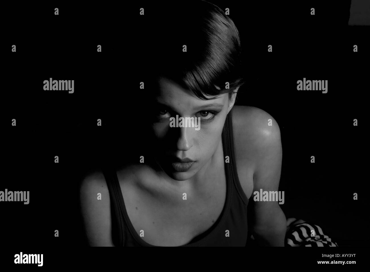 girl against a black background Stock Photo - Alamy