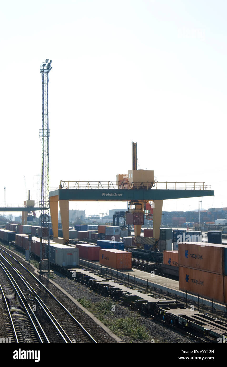 Containers being lifted on to railway carriages at the Freightliner ...