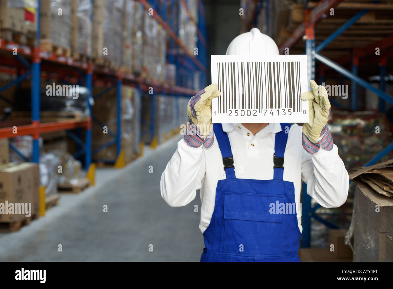 Worker covering his face with a big barcode Stock Photo - Alamy