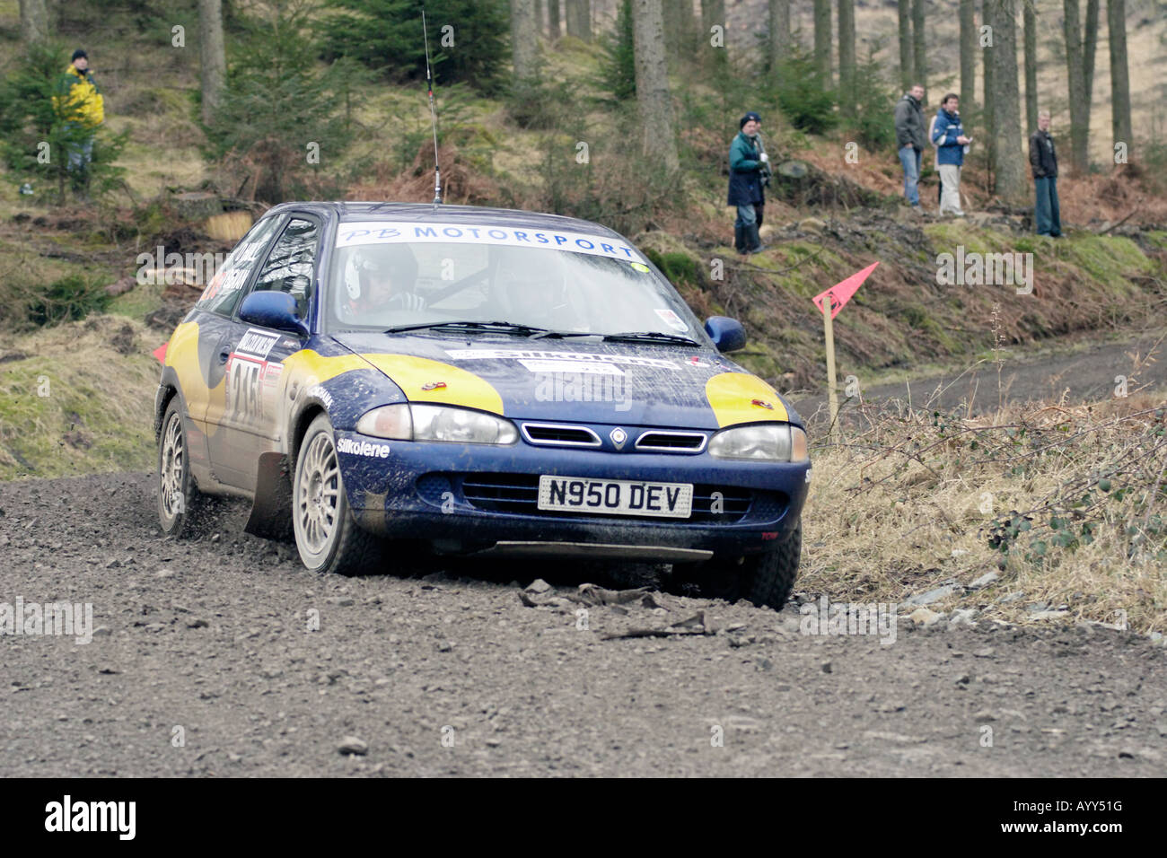 Rally car speeding around a corner at the Malcolm Wilson rally, Lake ...
