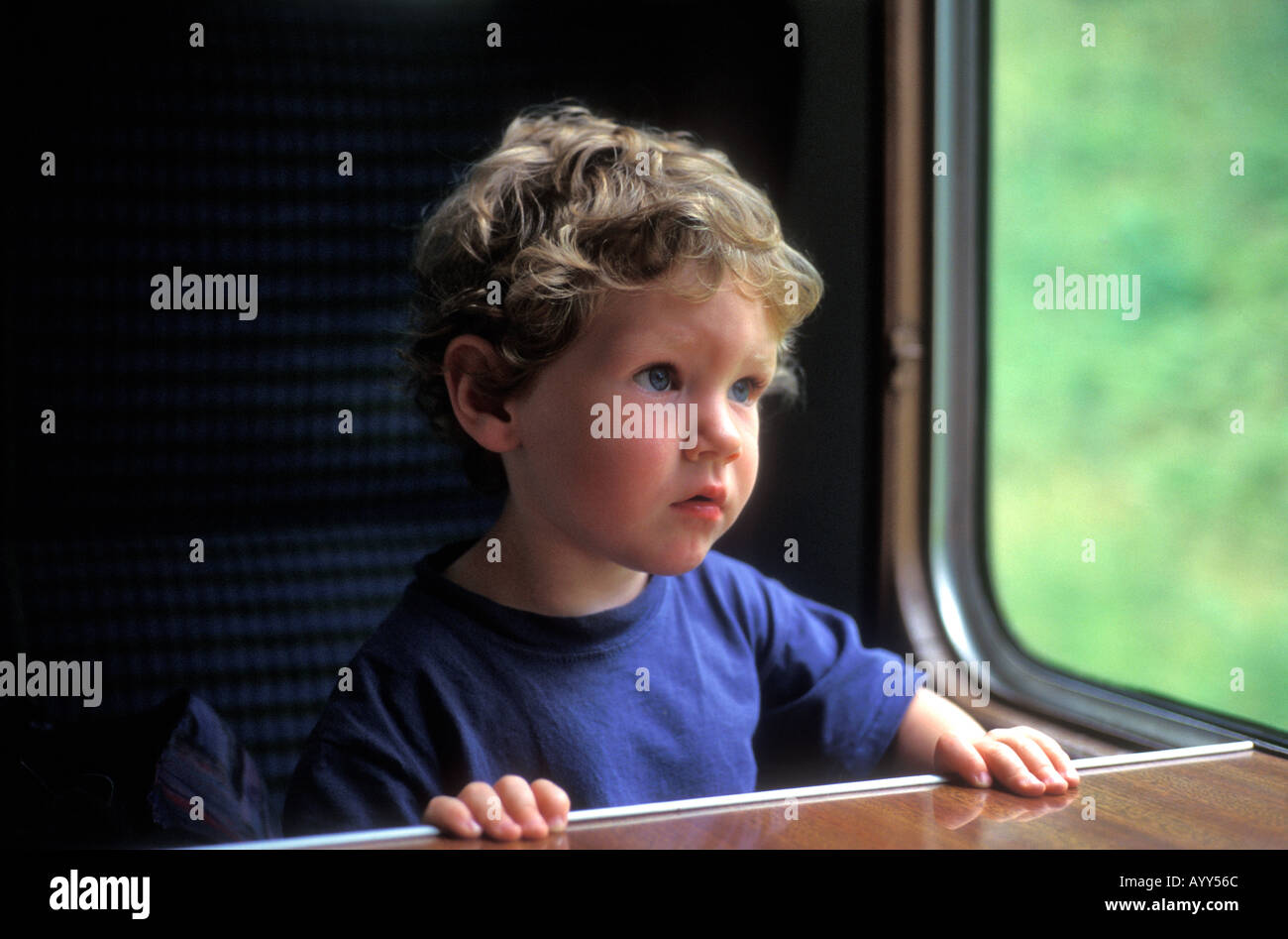 Boy on train Stock Photo - Alamy