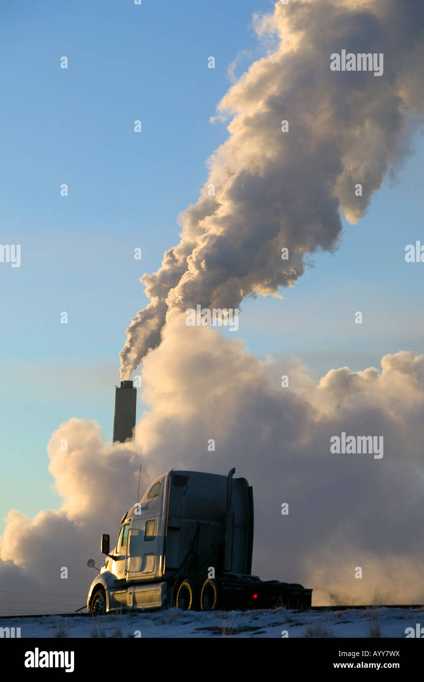 Steam from an electrical generating station on a cold early morning as ...