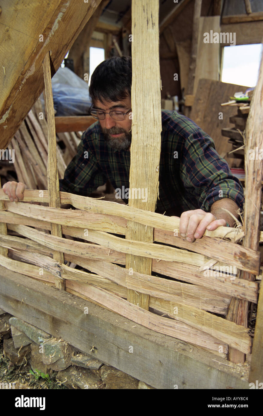 Mike Abbott building with Wattle and Daub walls with a green wood ...