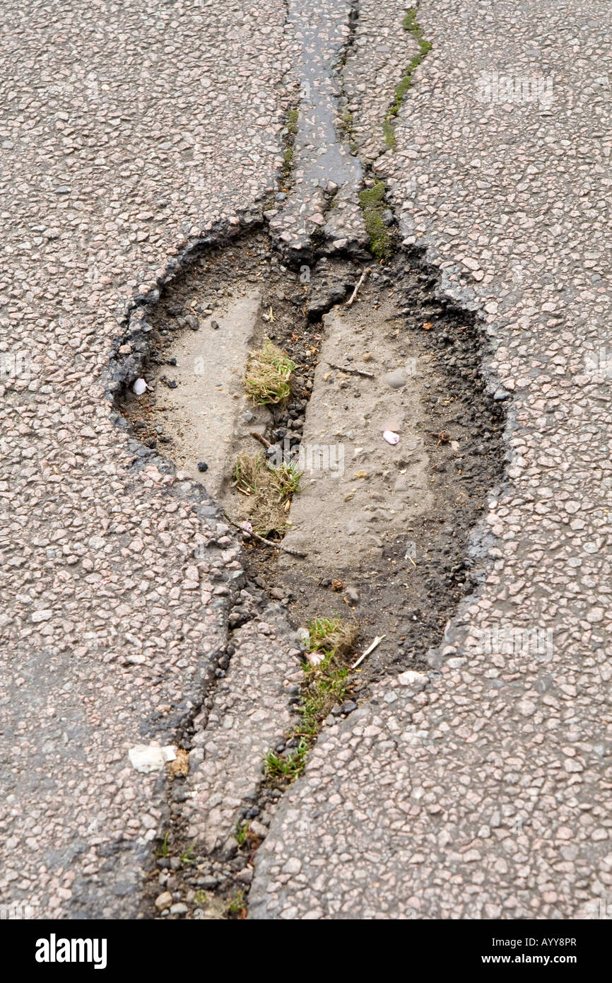 Hole in road hi-res stock photography and images - Alamy