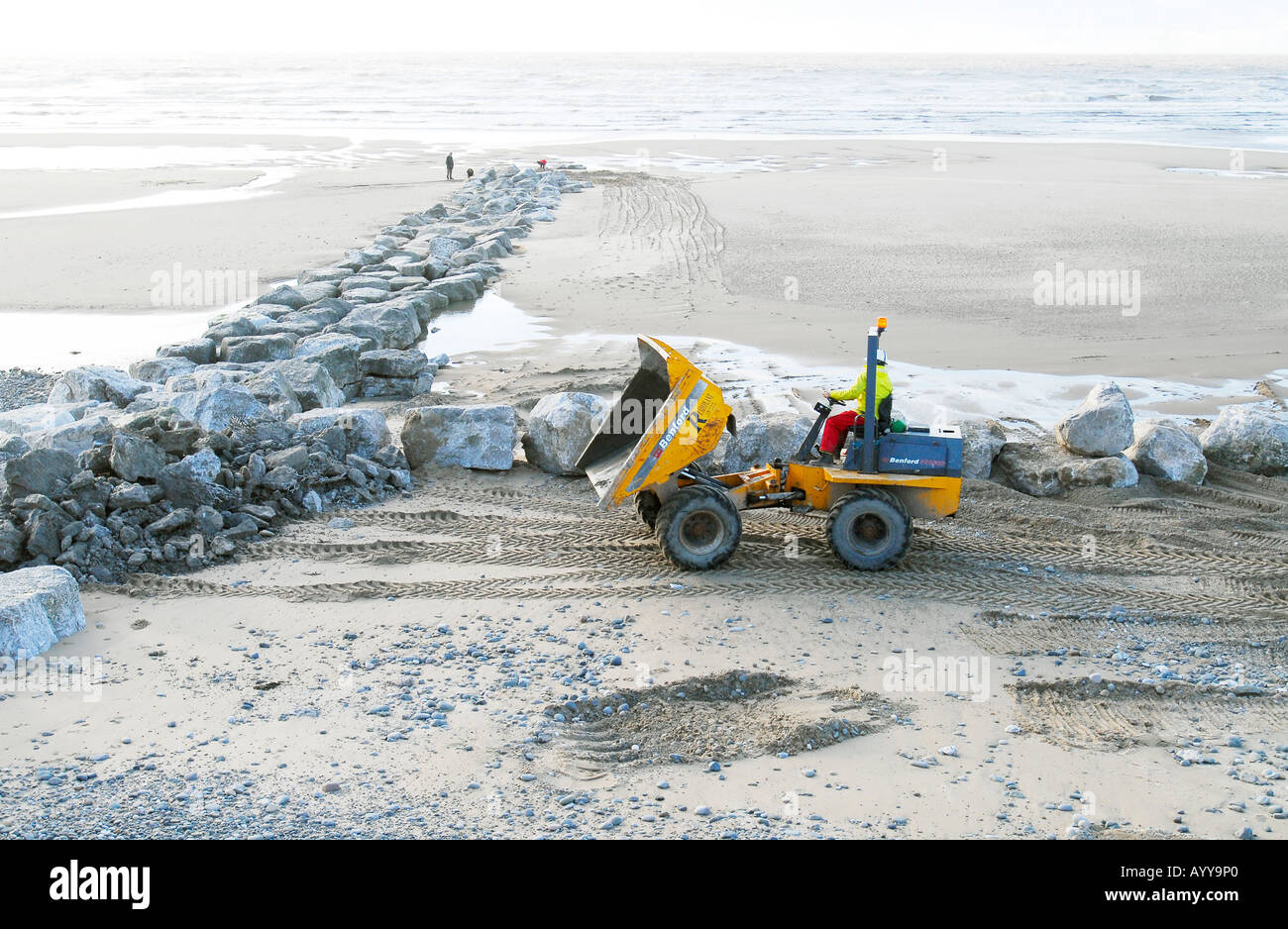 Building stone jetty Stock Photo - Alamy