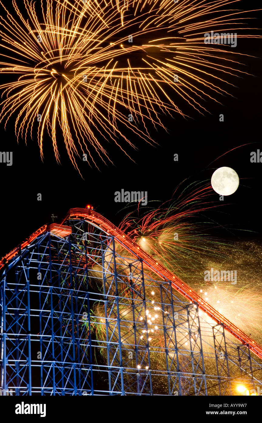 Fireworks display and full moon over the Big One roller coaster on the ...