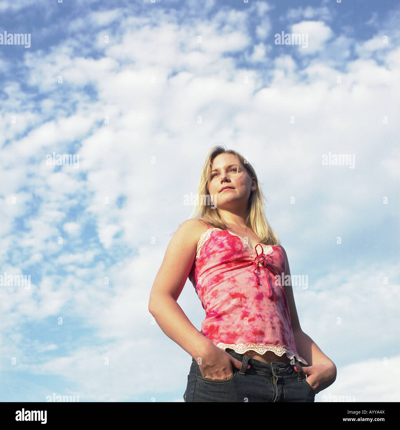 young woman standing outside Stock Photo - Alamy