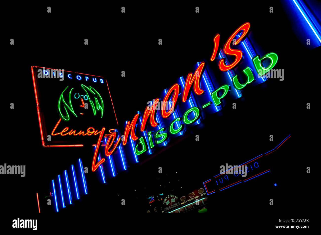 Neon signs entice holidaymakers into the bars and cabaret shows in ...