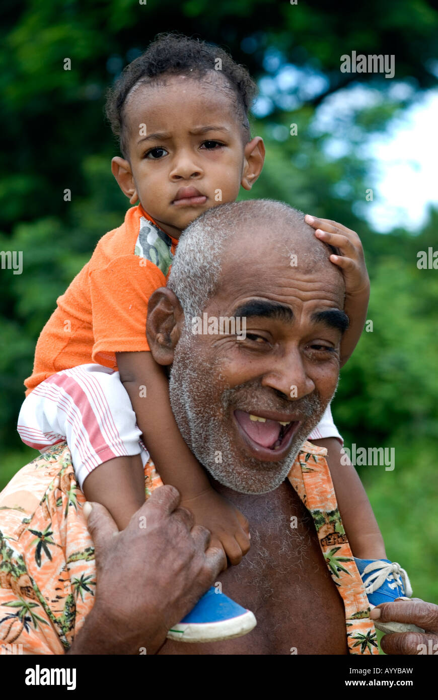 fiji sigatoka grandfather baby in village Stock Photo - Alamy