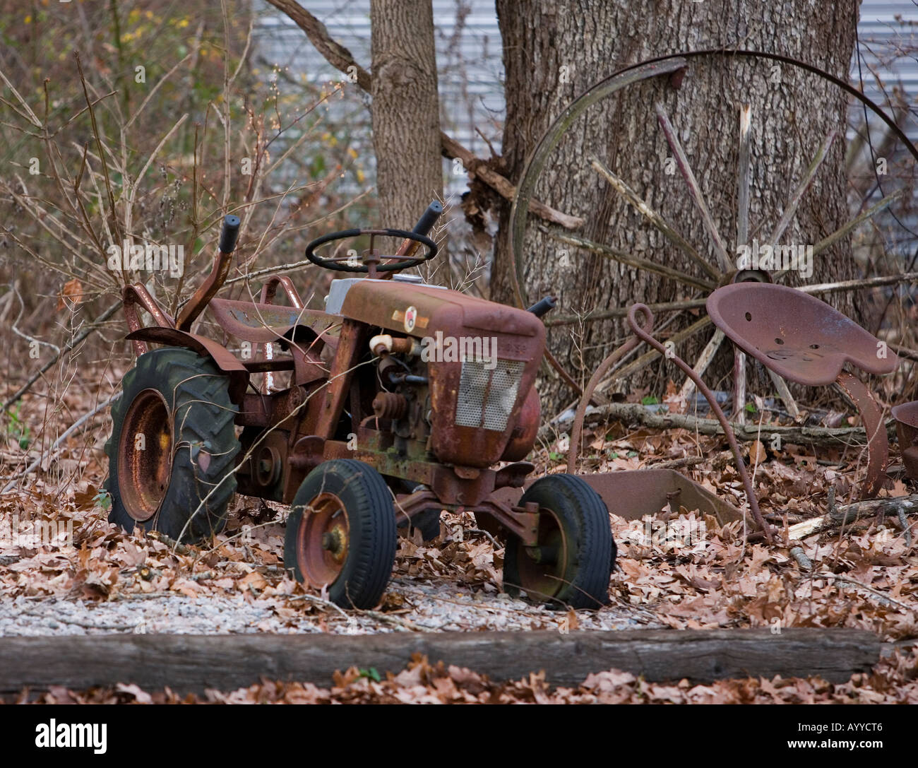 Old farm tractor near a farm house Stock Photo - Alamy