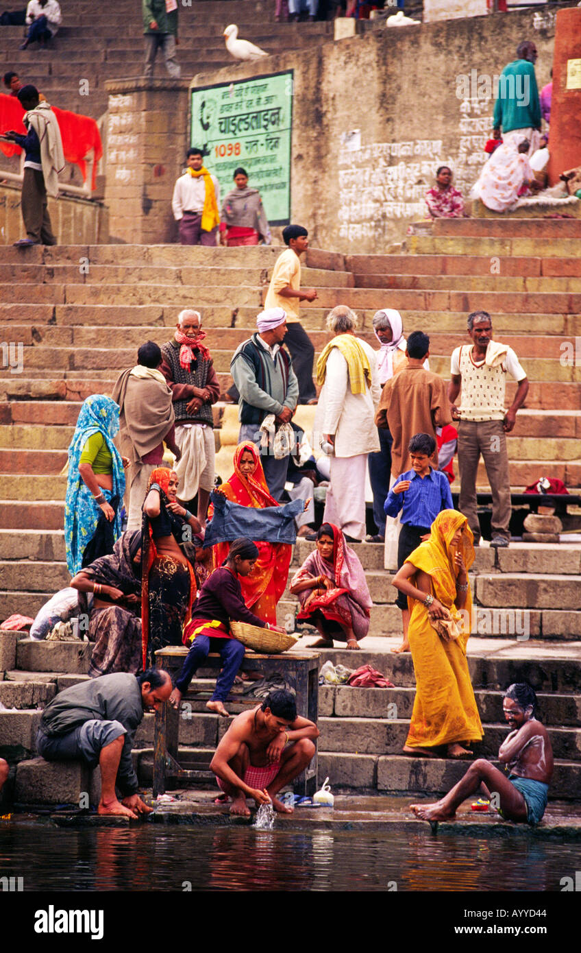 Indian women bathing washing clothes hi-res stock photography and ...