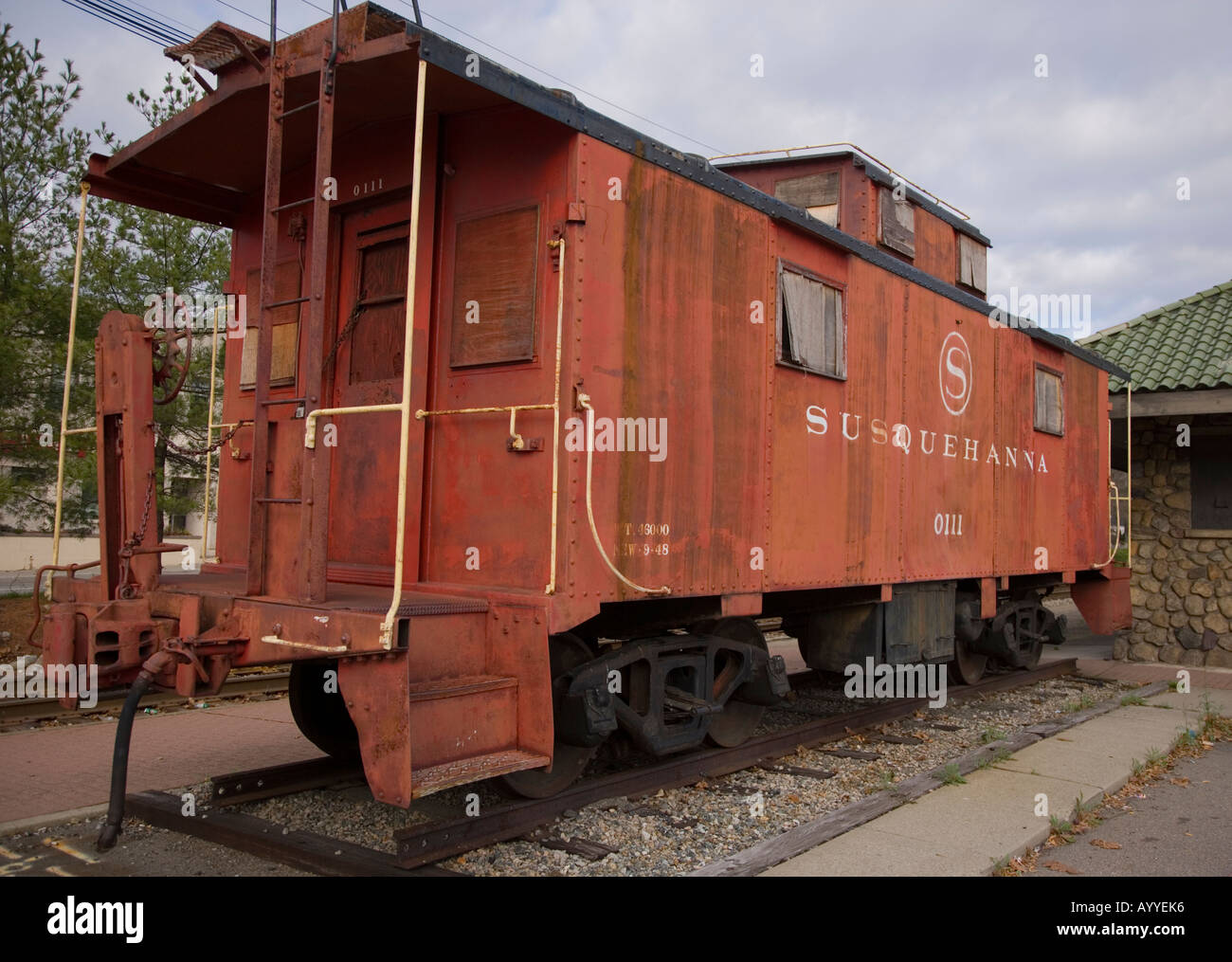 Old railroad car on a section of track Stock Photo - Alamy