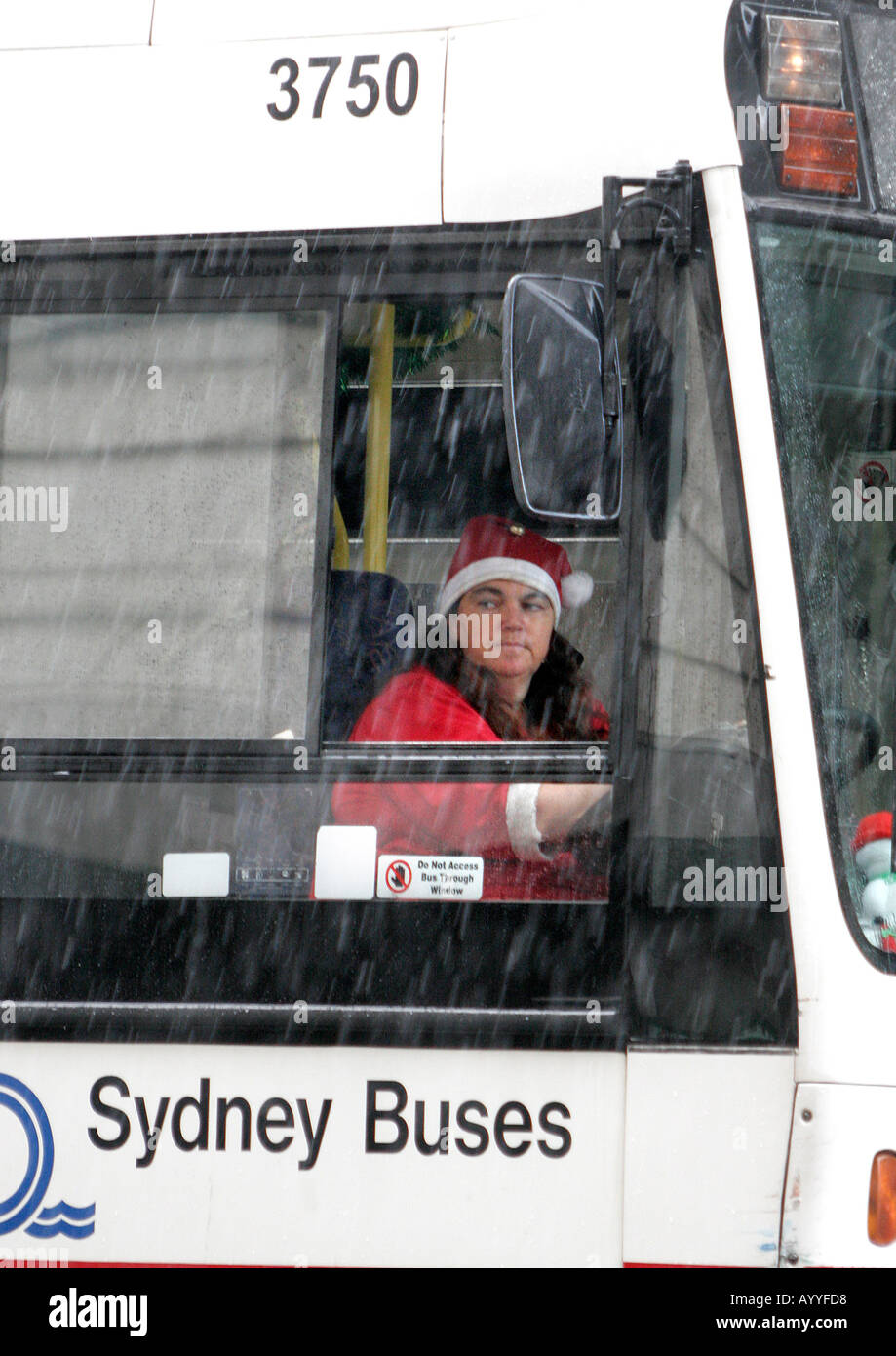 A Sydney bus driver wears a santa claus suit Stock Photo - Alamy