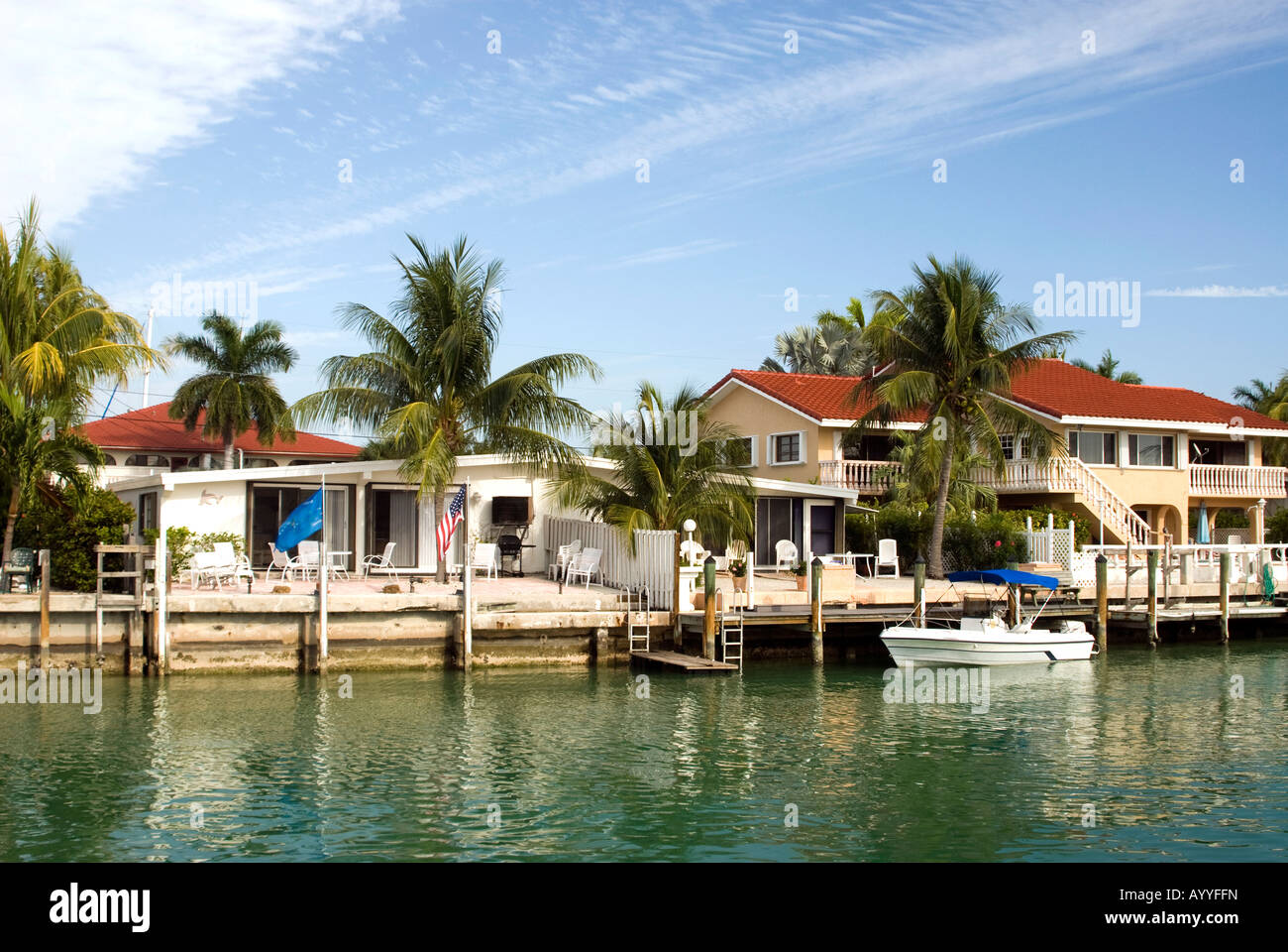 canal channel with boats and houses florida keys typical architecture ...