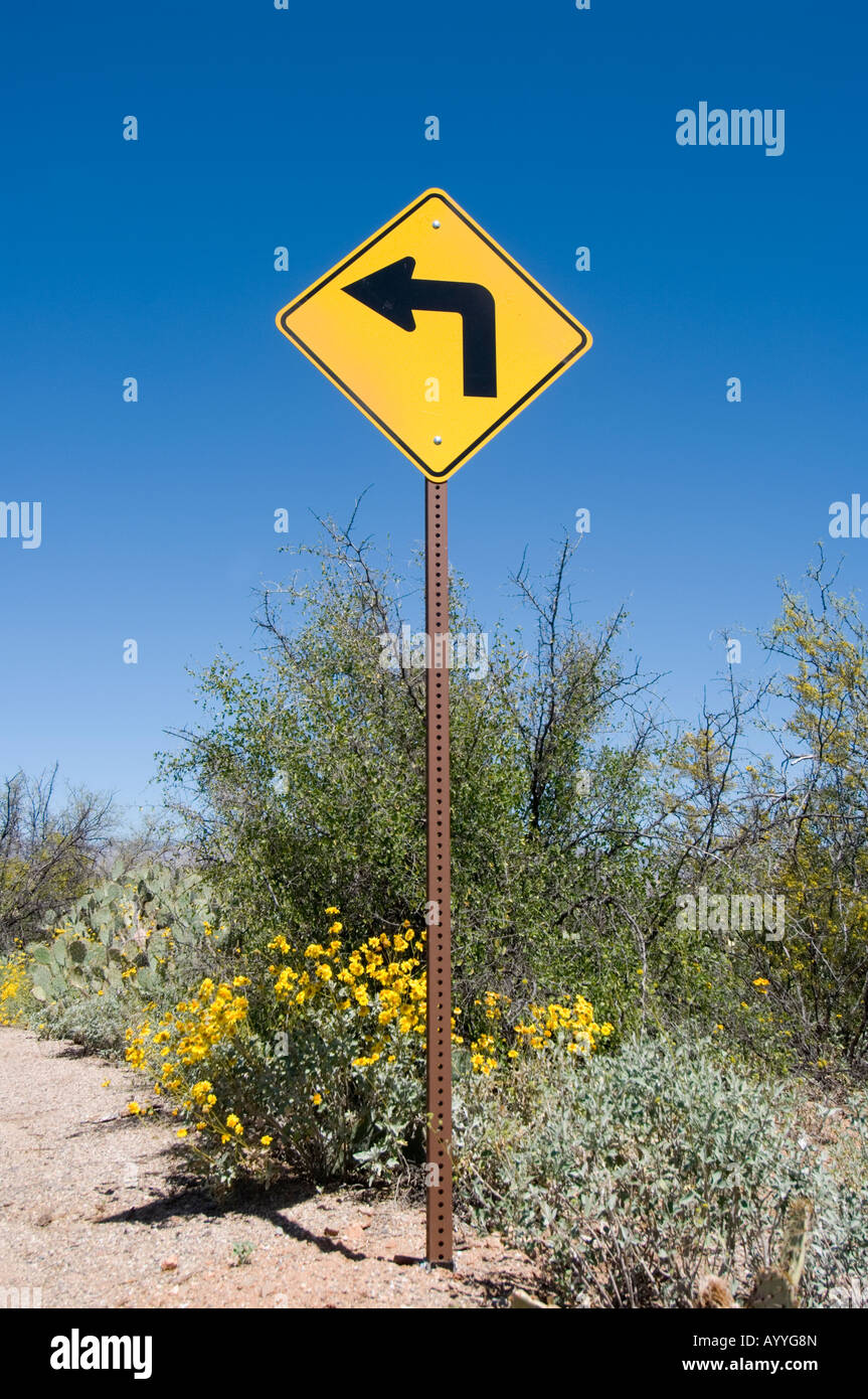 Left curve road sign Arizona USA Stock Photo - Alamy